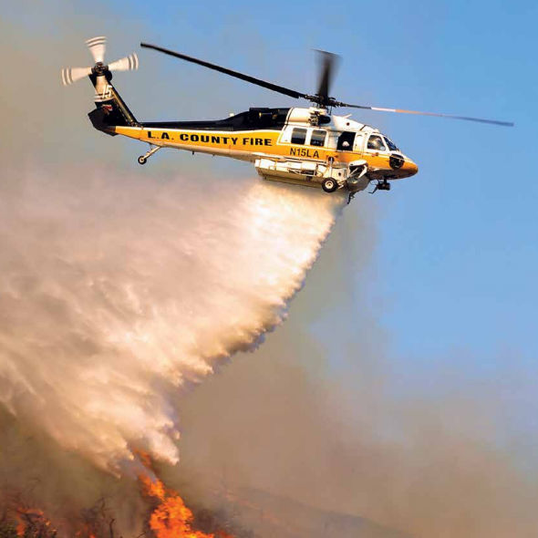 Avion bombardier d'eau retardant - FIREHAWK® - LOCKHEED MARTIN ...