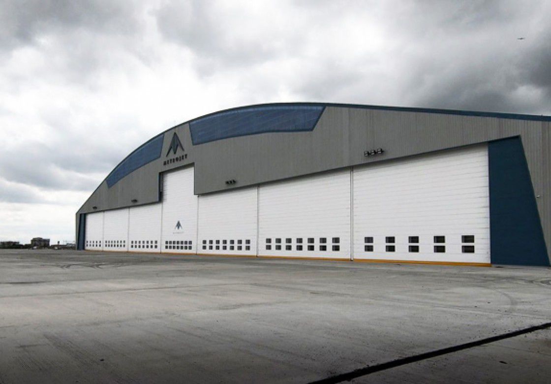 Folding hangar door - NK4 - CHAMPION DOOR - for aircraft / fabric / PVC