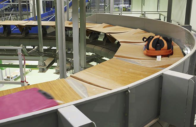 Tilt-tray sorter - HELIXORTER - VANDERLANDE - for baggage / for airport