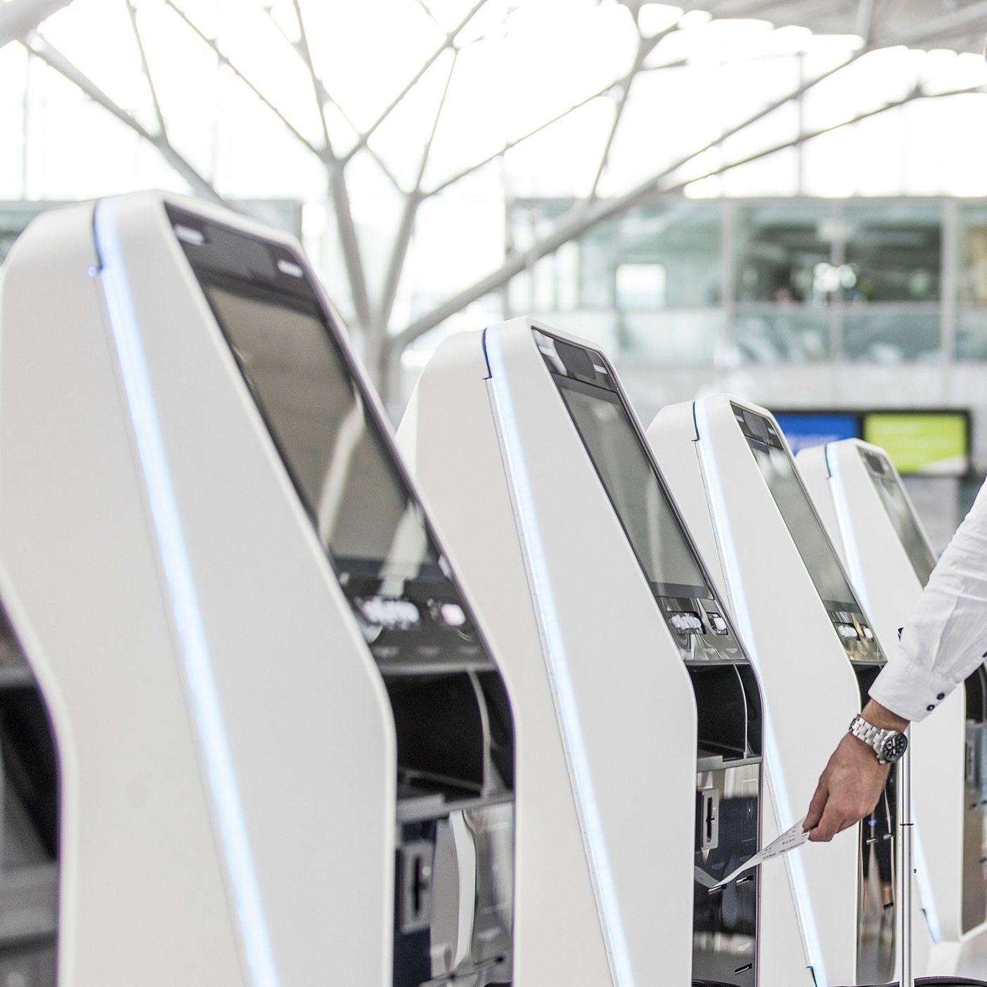 Check-in kiosk with printer - Amadeus IT Group SA - with boarding pass ...