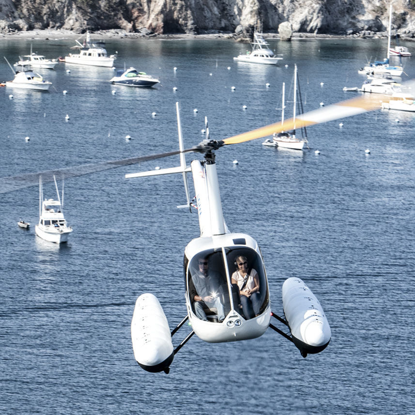 Two-seater helicopter - R44 Cadet - ROBINSON - utility / cargo / piston ...