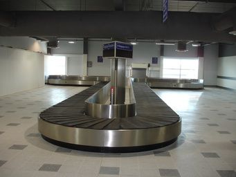 Half moon baggage claim carousel - Robson Handling Technology Ltd ...