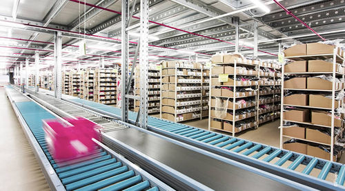 Baggage carousel - Fives Intralogistics